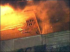 Los Angeles Firefighter Saved after Falling Through Roof | Firehouse