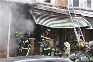 Firefighters Battle Three Alarm Fire in West Baltimore | Firehouse