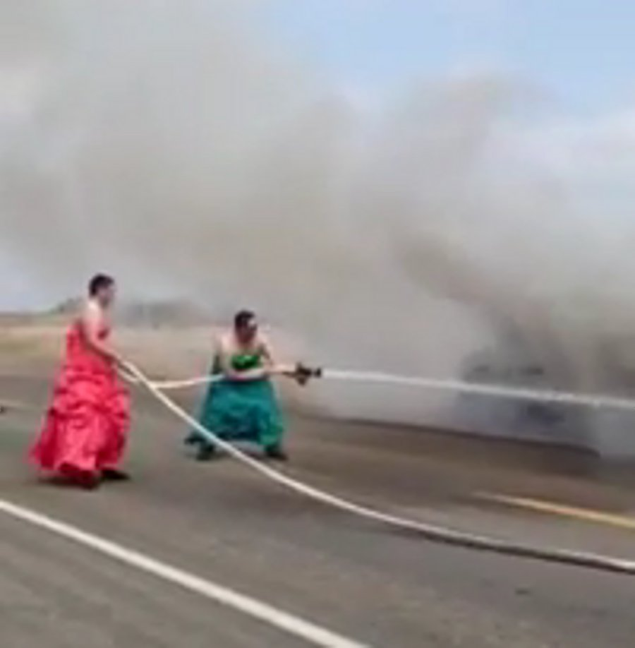 Two Minnesota Firefighters In Drag Douse Car Fire at Parade | Firehouse