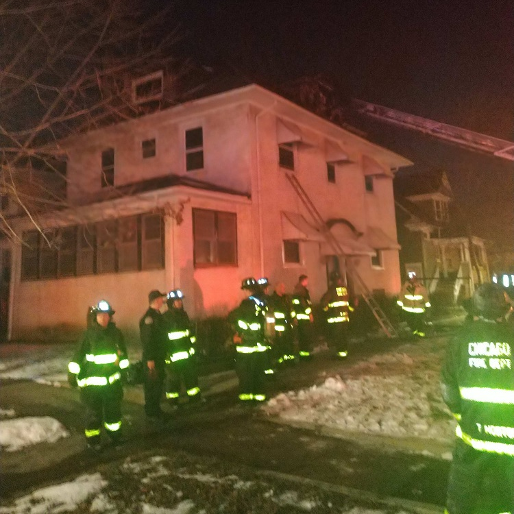 Chicago Crews Rescue Man from Roof of Burning Home | Firehouse