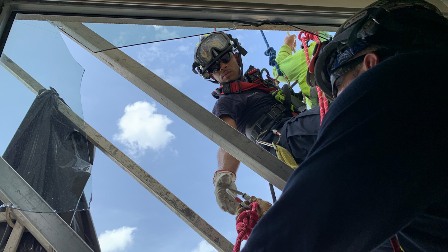 Photos: Houston Firefighters Rescue Window Washers | Firehouse