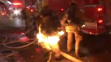 Video: Los Angeles Firefighter's Gear Catches Fire During Blaze | Firehouse