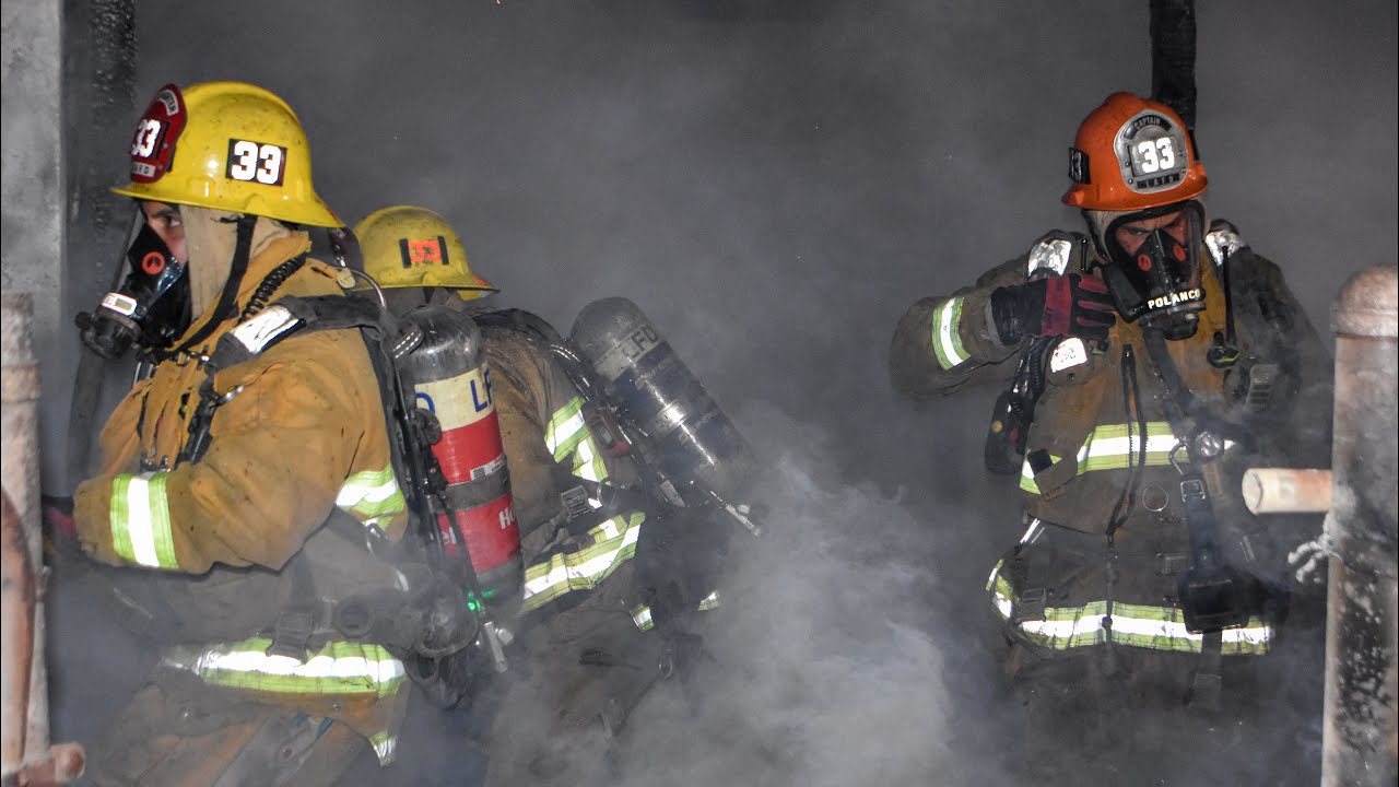 Watch LAFD Crews Battle Fire at Vacant House | Firehouse