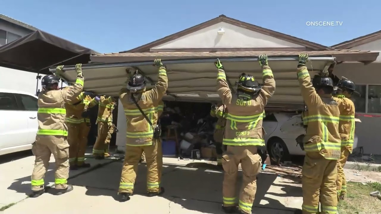 San Diego CA Fire Rescue Crews Rescue Driver After Car Crashes into Home | Firehouse