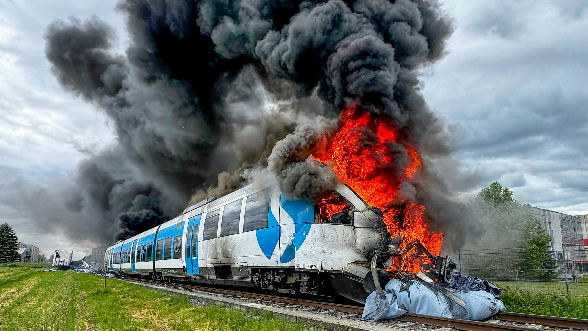 Train Burns after Striking Truck at Wollsdorf Austrian Railroad ...